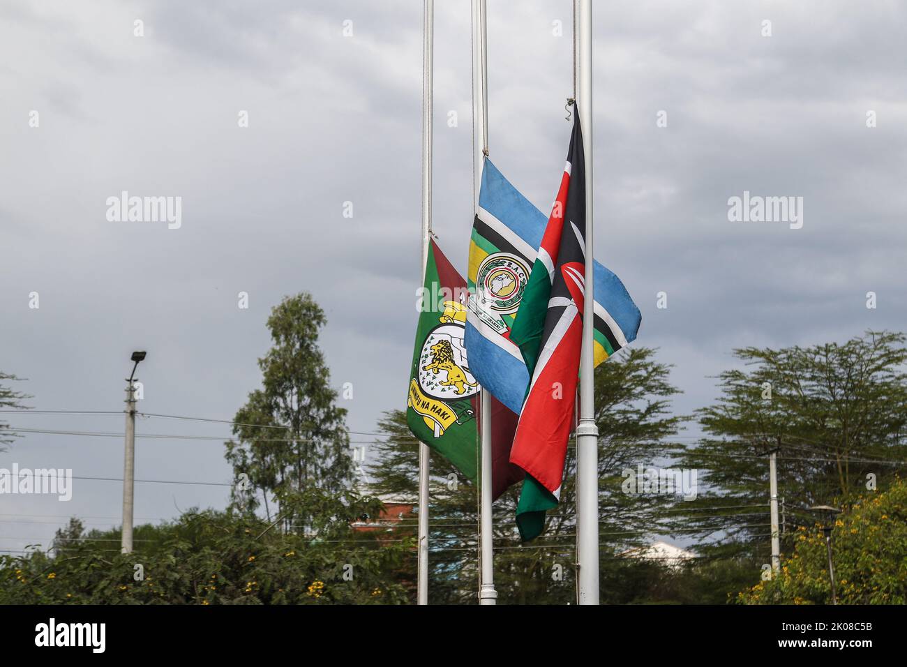 Nakuru, Kenya. 10th Sep, 2022. The flag of Kenya (R), East African ...