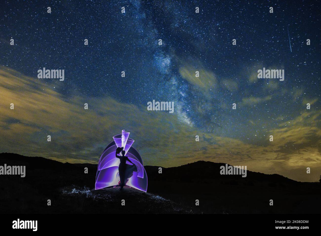 Night photography, light painting with the milky way in the background ...