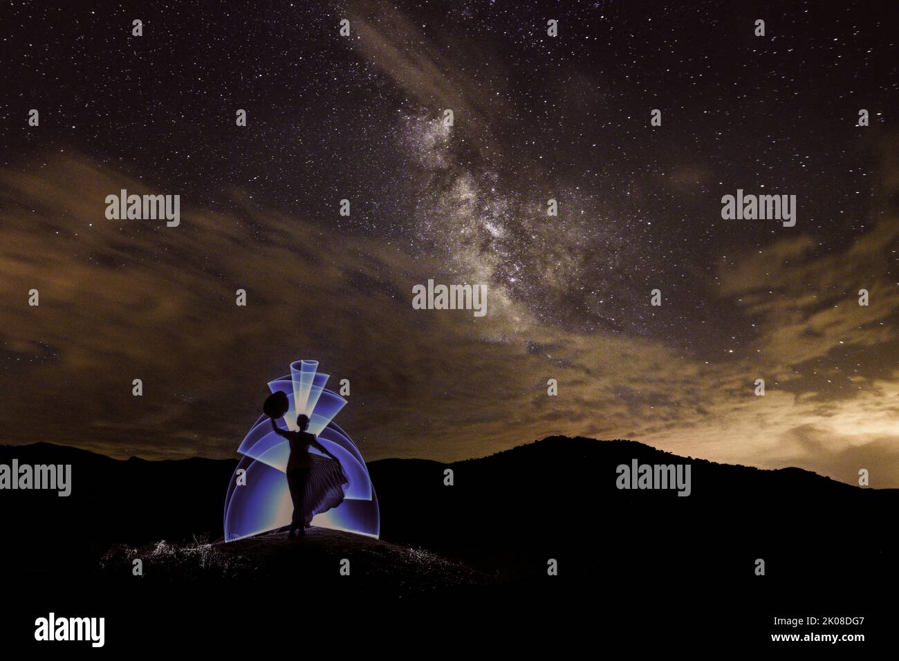 Night photography, light painting with the milky way in the background ...