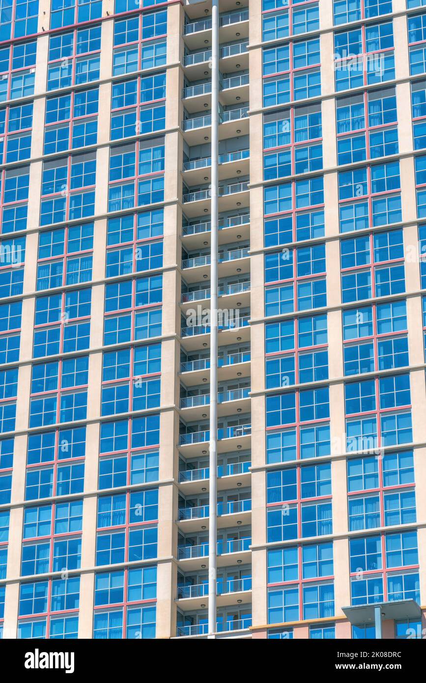 Glass windows and balconies at the facade of apartments in Austin Texas ...
