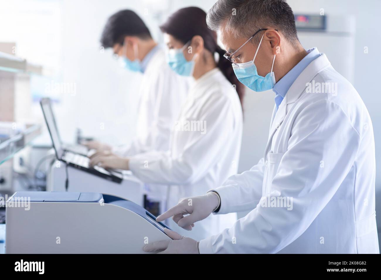 Medical researchers working in hospital hi-res stock photography and ...