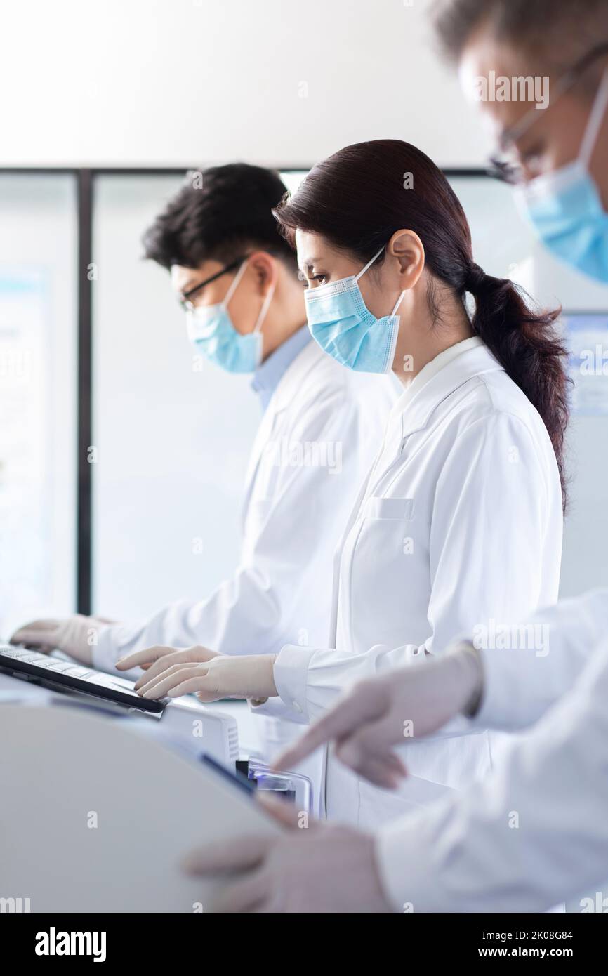 Medical researchers working in hospital hi-res stock photography and ...