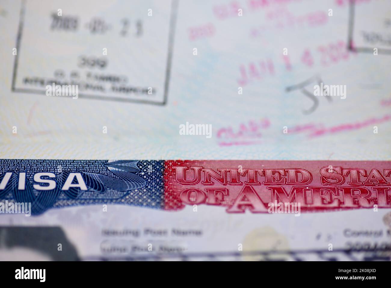 Visa seen inside passport Stock Photo - Alamy