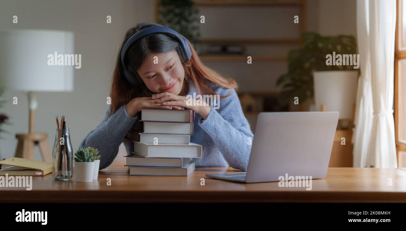 Young college student have question and answer to teacher by video call ...