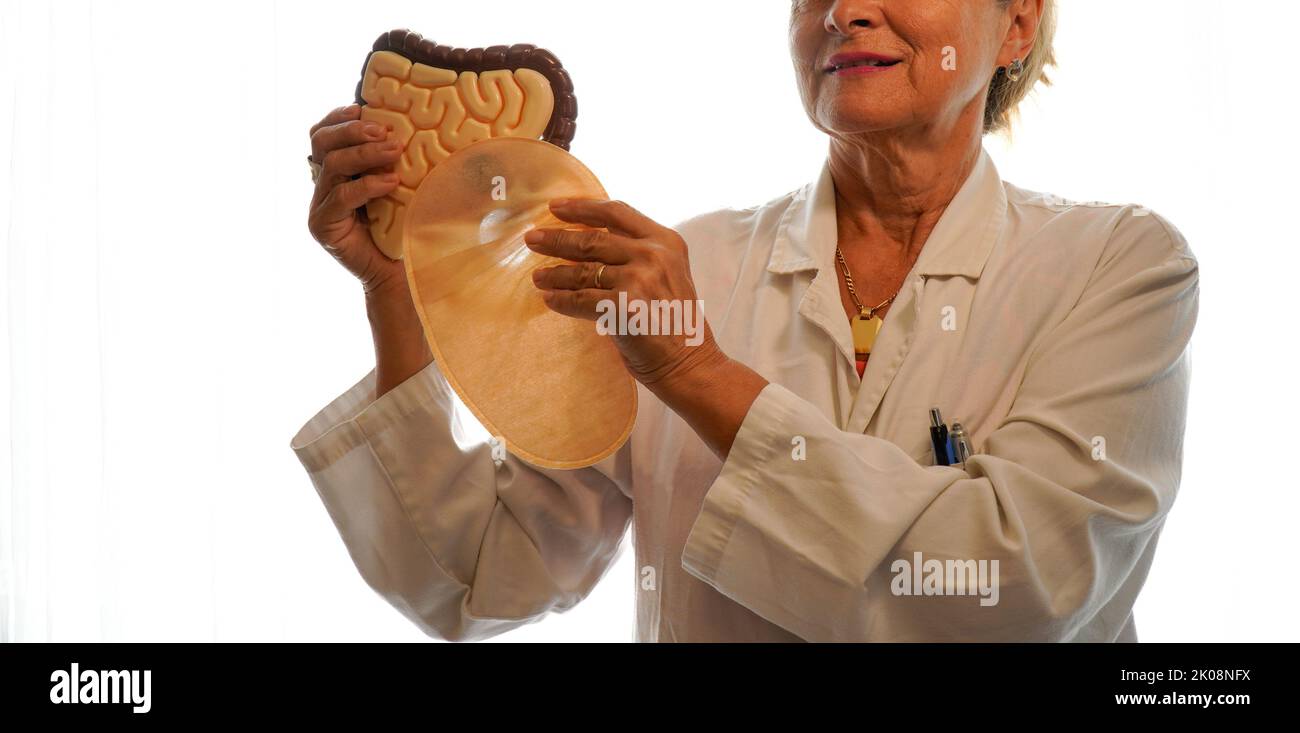 woman doctor teach colostomy bag in the intestine Stock Photo - Alamy