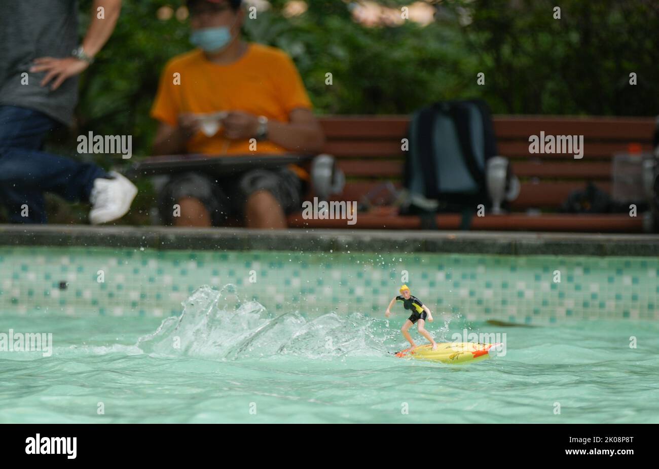 People playing remote control boat at the model boat pool in Victoria ...