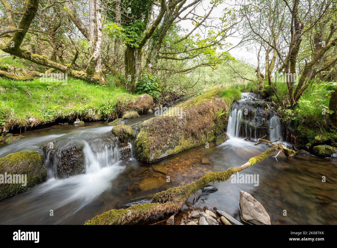 Long exposure of the Weir Water river flowing through the valley at ...