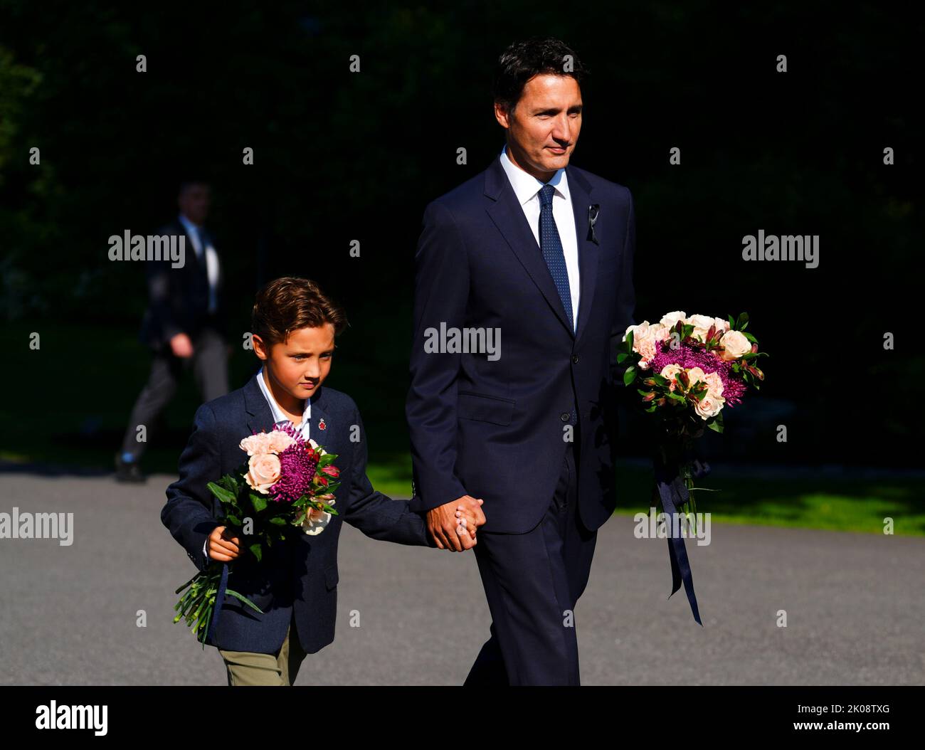 Prime Minister Justin Trudeau and son Hadrien arrive to place flowers ...