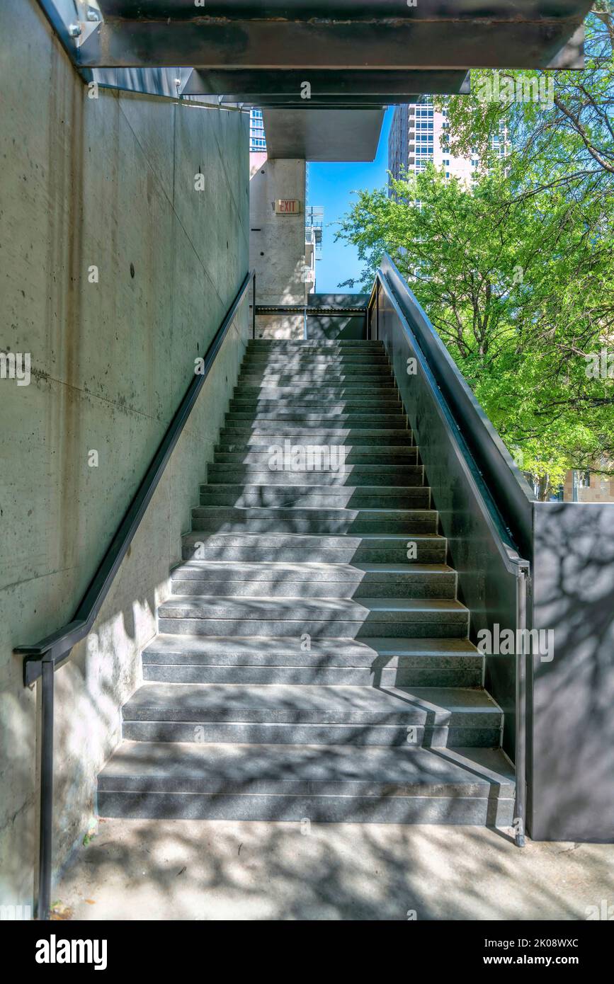 View from the bottom of the staircase leading up to a building in ...