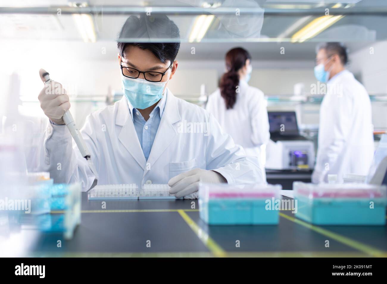 Three researchers in laboratory hi-res stock photography and images - Alamy