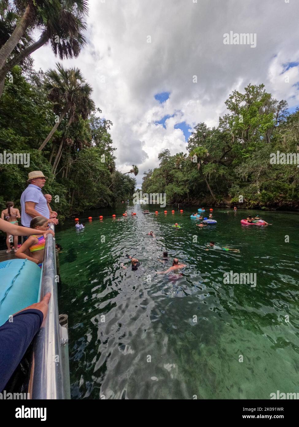 Orlando, FL USA - August 5, 2022: People floating down the spring in ...