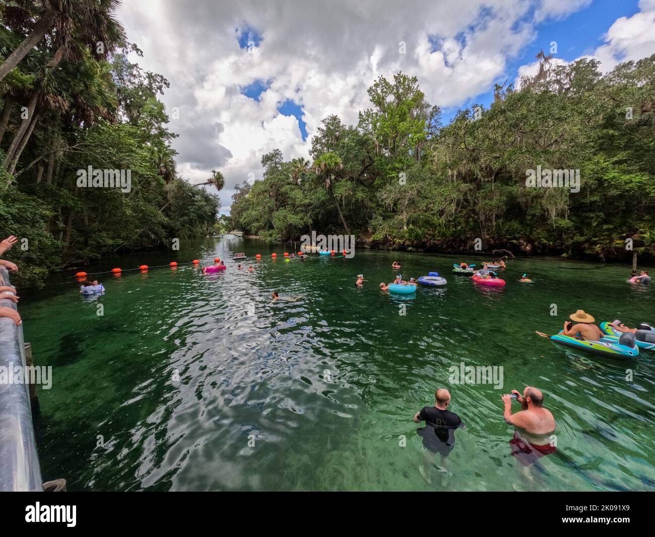 Orlando, FL USA - August 5, 2022: People floating down the spring in ...