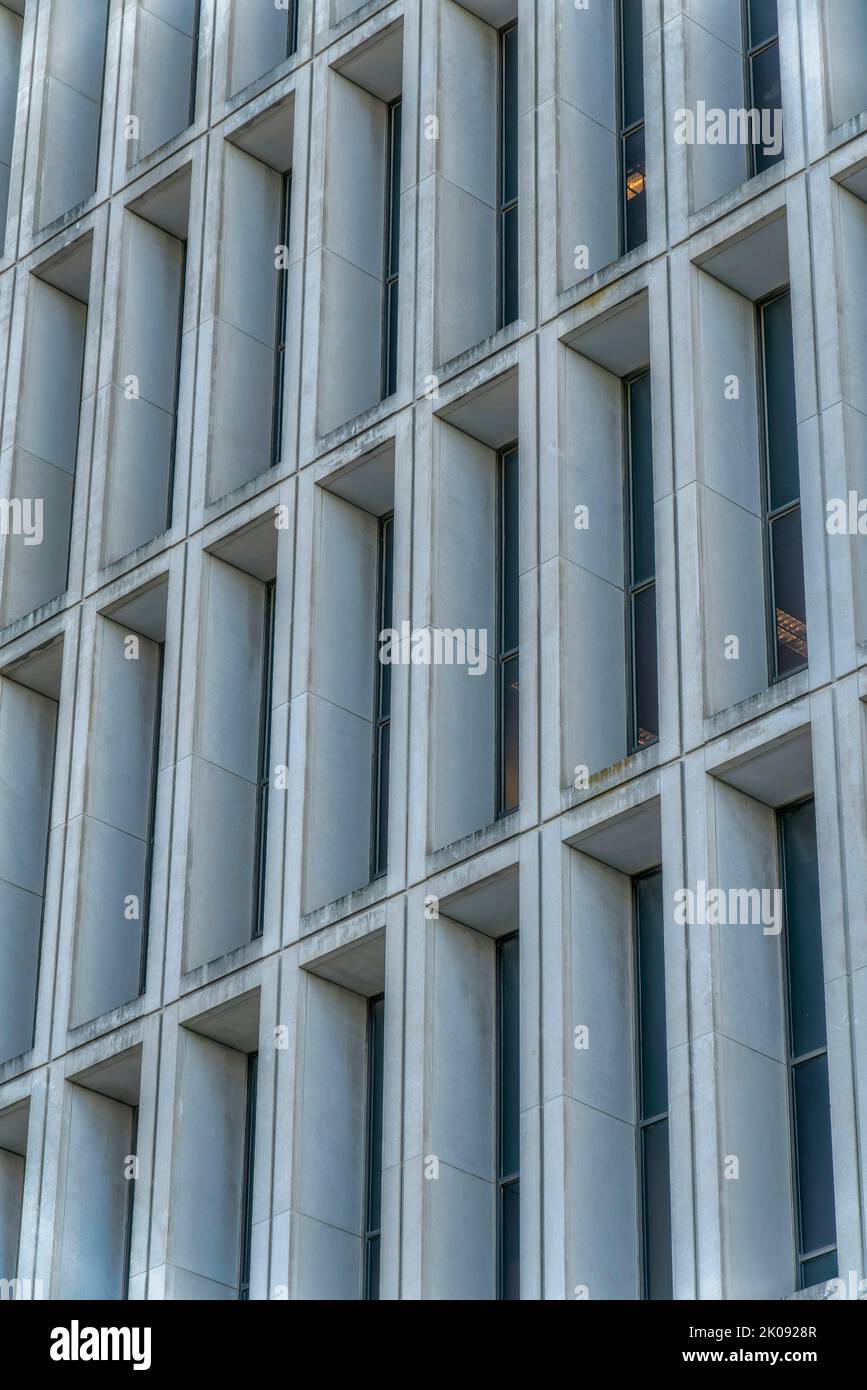 Modern concrete building in Austin Texas with tall rectangular windows ...