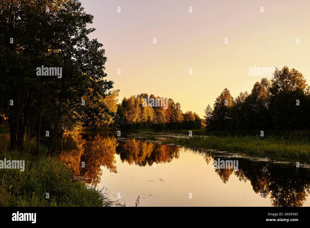 Beautiful summer landscape of river at sunset with sky reflection in ...