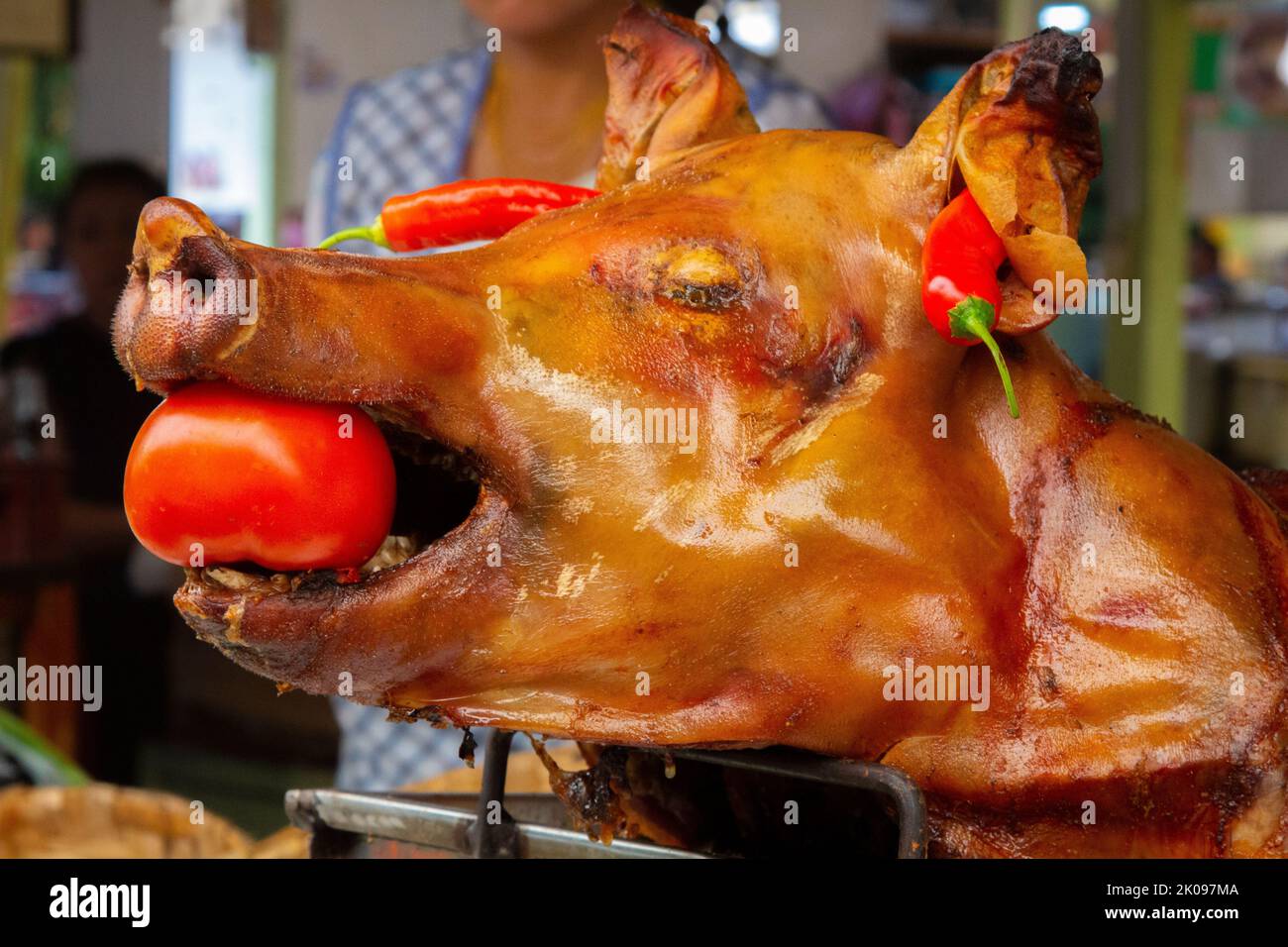 Roasted hog roast pig for sale in Otavalo Market in the Andean ...