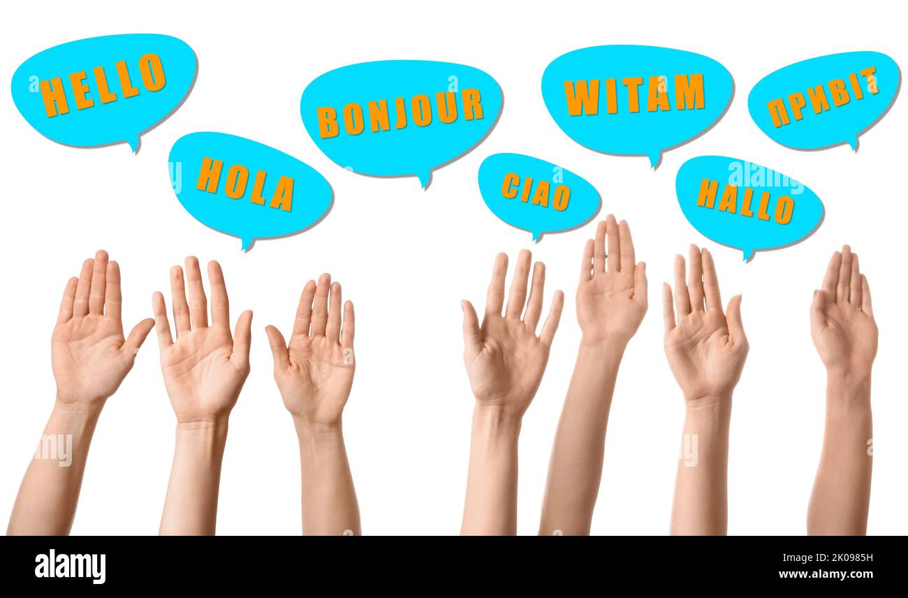 Many raised hands and speech bubbles with words HELLO in different ...