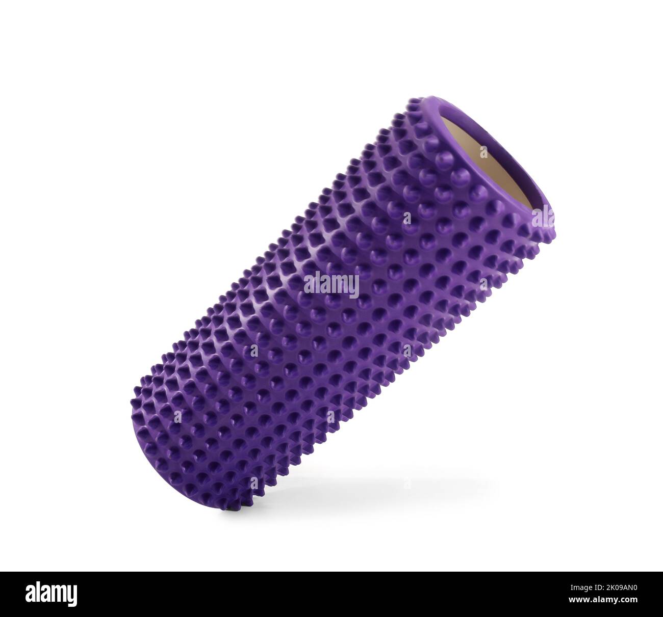 Purple foam roller on white background Stock Photo - Alamy