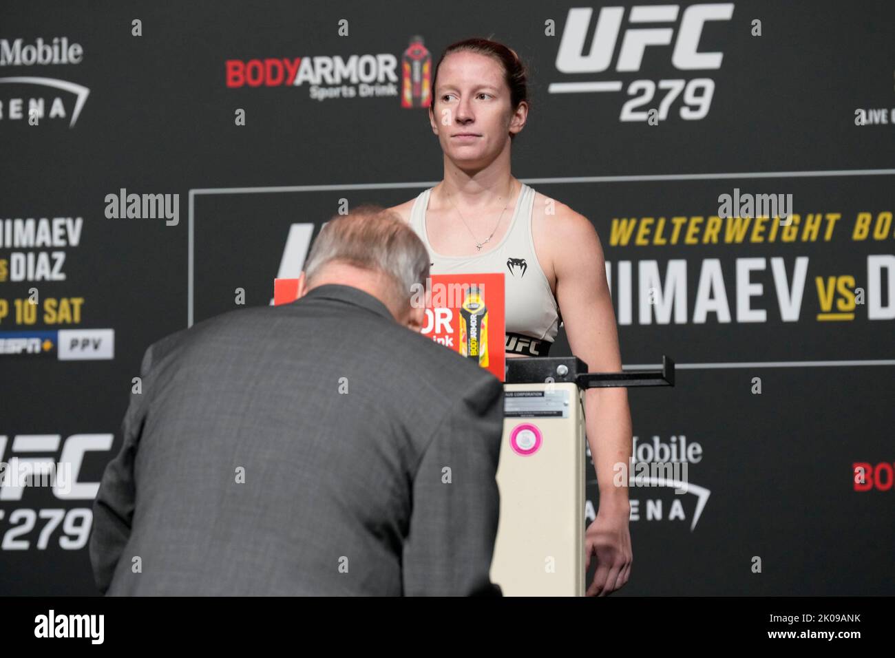 LAS VEGAS, NV - September 9: Elise Reed steps on the scale for the ...