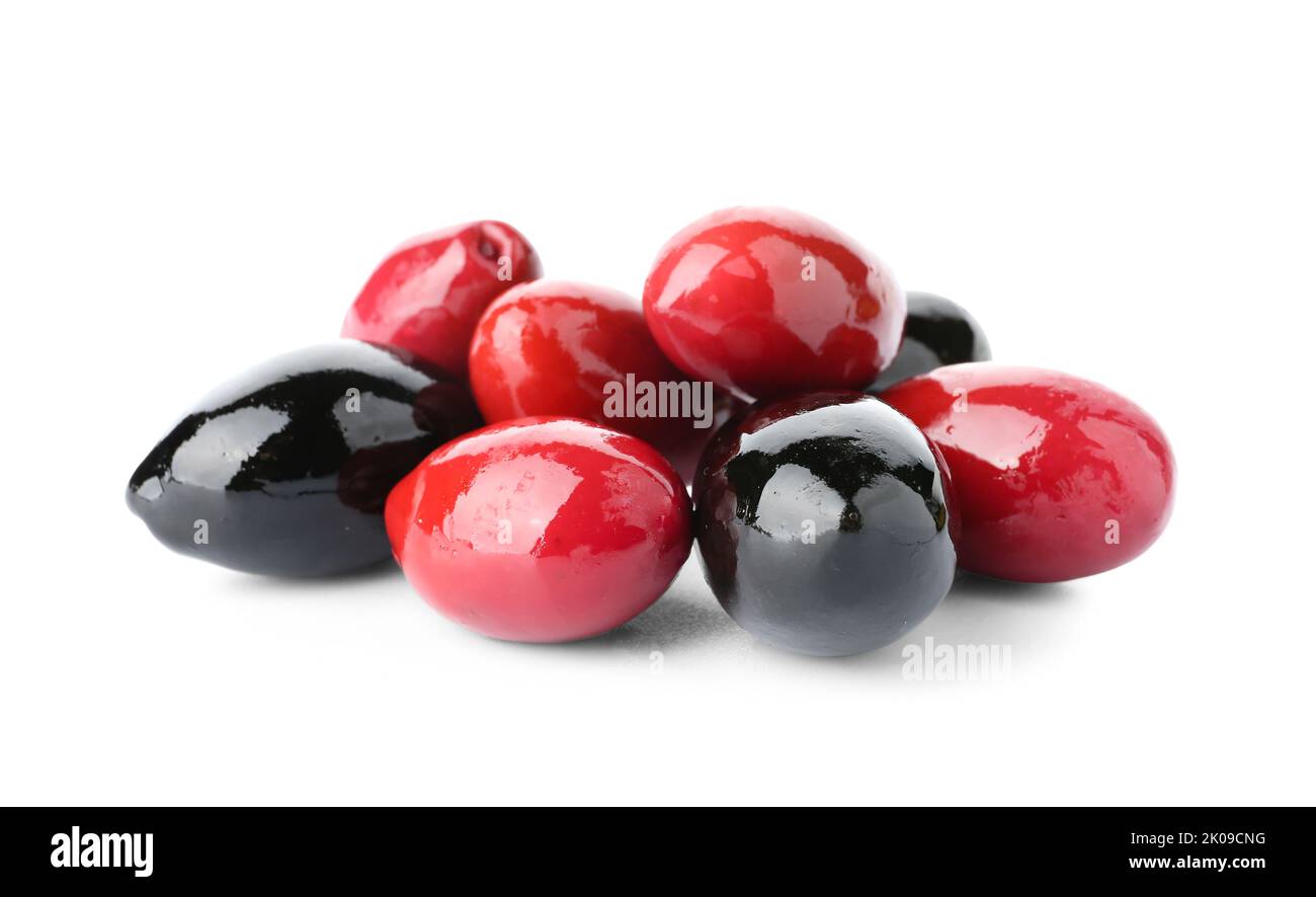 Heap of black and red olives on white background Stock Photo - Alamy