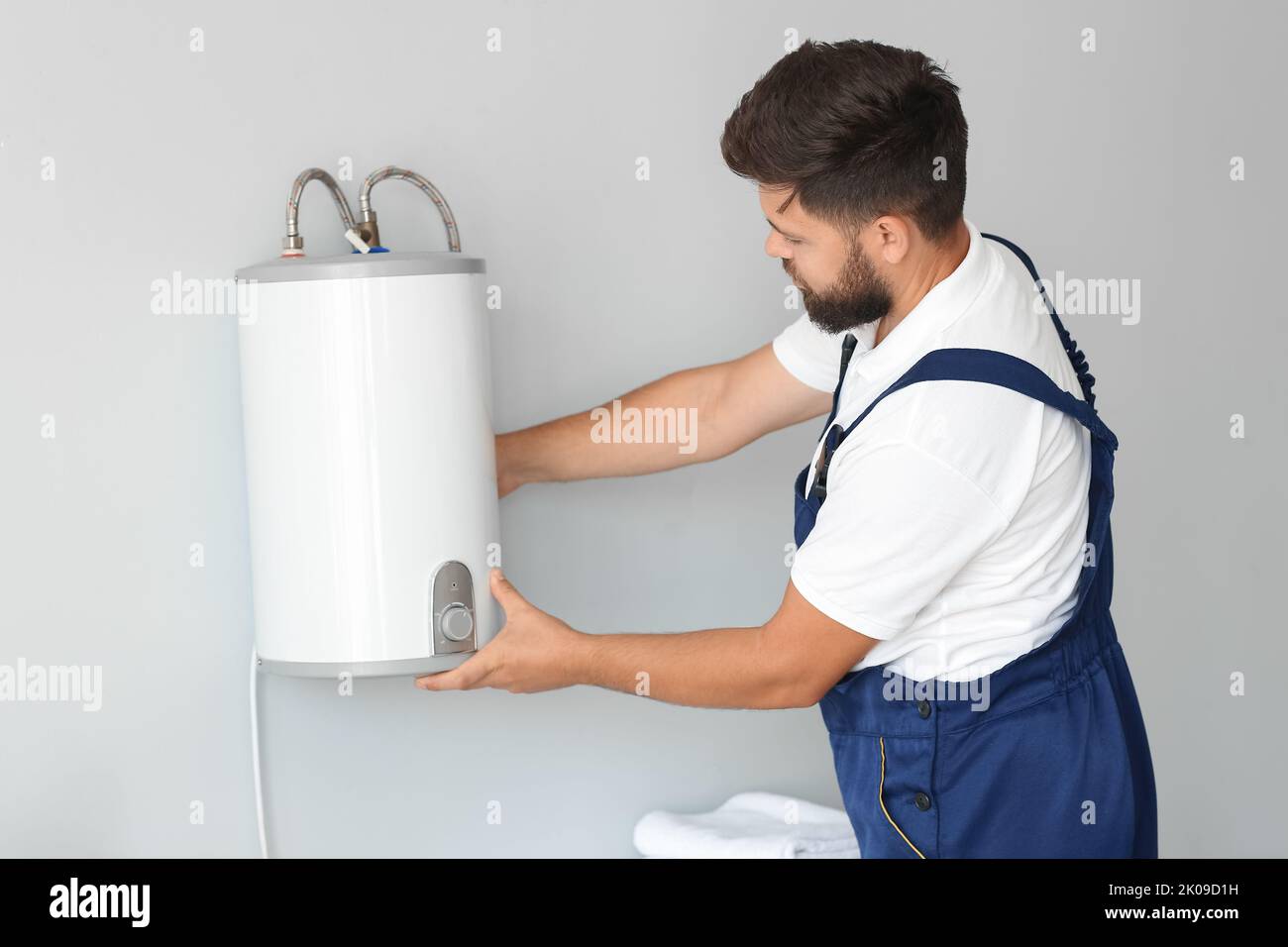 Installing boiler hi-res stock photography and images - Alamy