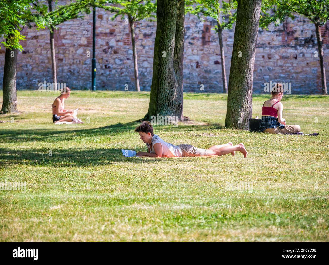 Prague, Czech Republic - June 2022: Young girls or women relaxing on ...