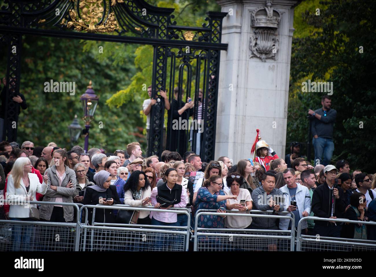 Spectators await the Accession Council at St James's Palace in London ...