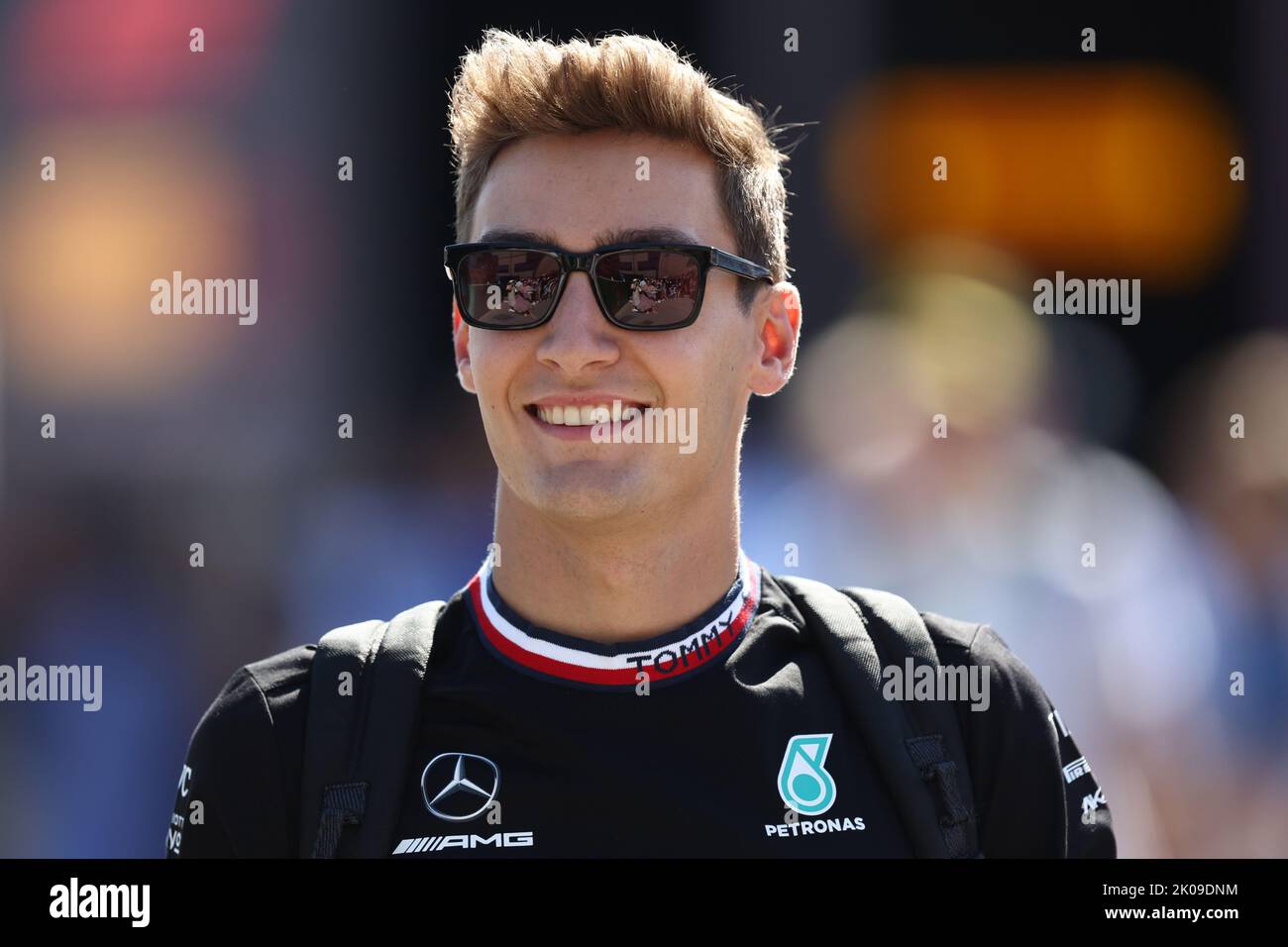 George Russell of Mercedes AMG Petronas F1 Team looks on in the paddock ...
