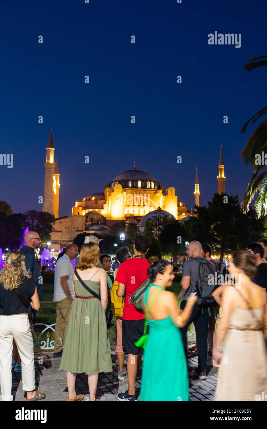 Travel to Istanbul photo. Tourists taking photos of Hagia Sophia from Sultanahmet Square ...