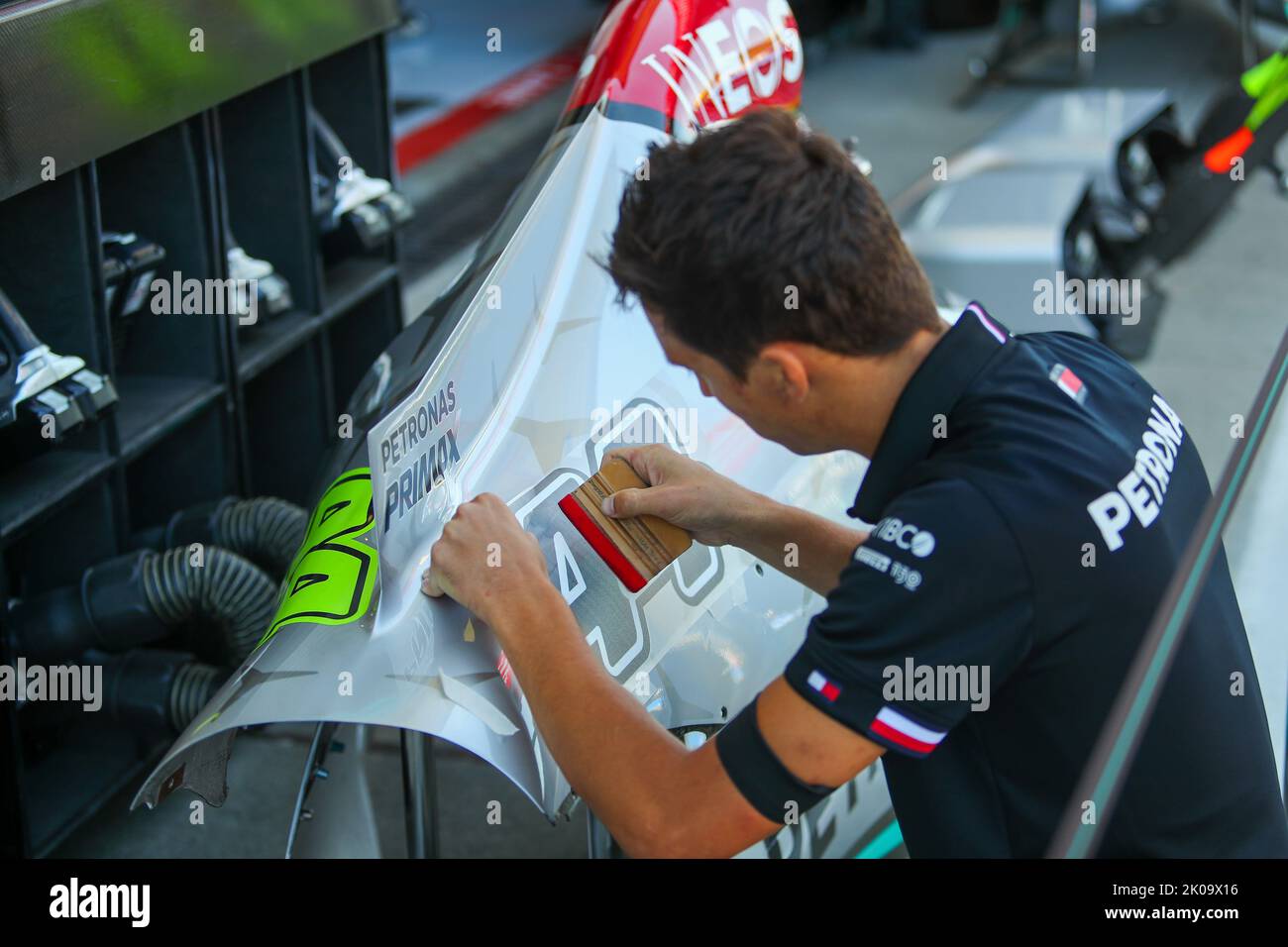 mechanicals at work on the car Mercedes-AMG Petronas F1 Team Stock ...