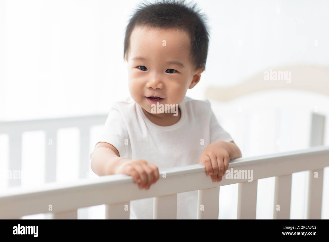 Cute Chinese baby playing at home Stock Photo - Alamy