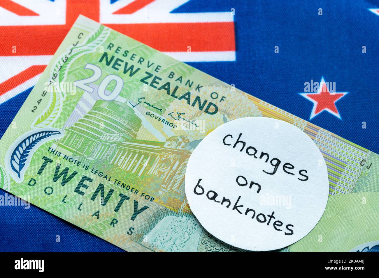 New Zealand 20 dollar banknote with a masked face of the queen and ...
