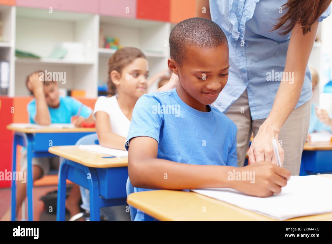 Your method is correct but check your answer. A female teacher helping ...