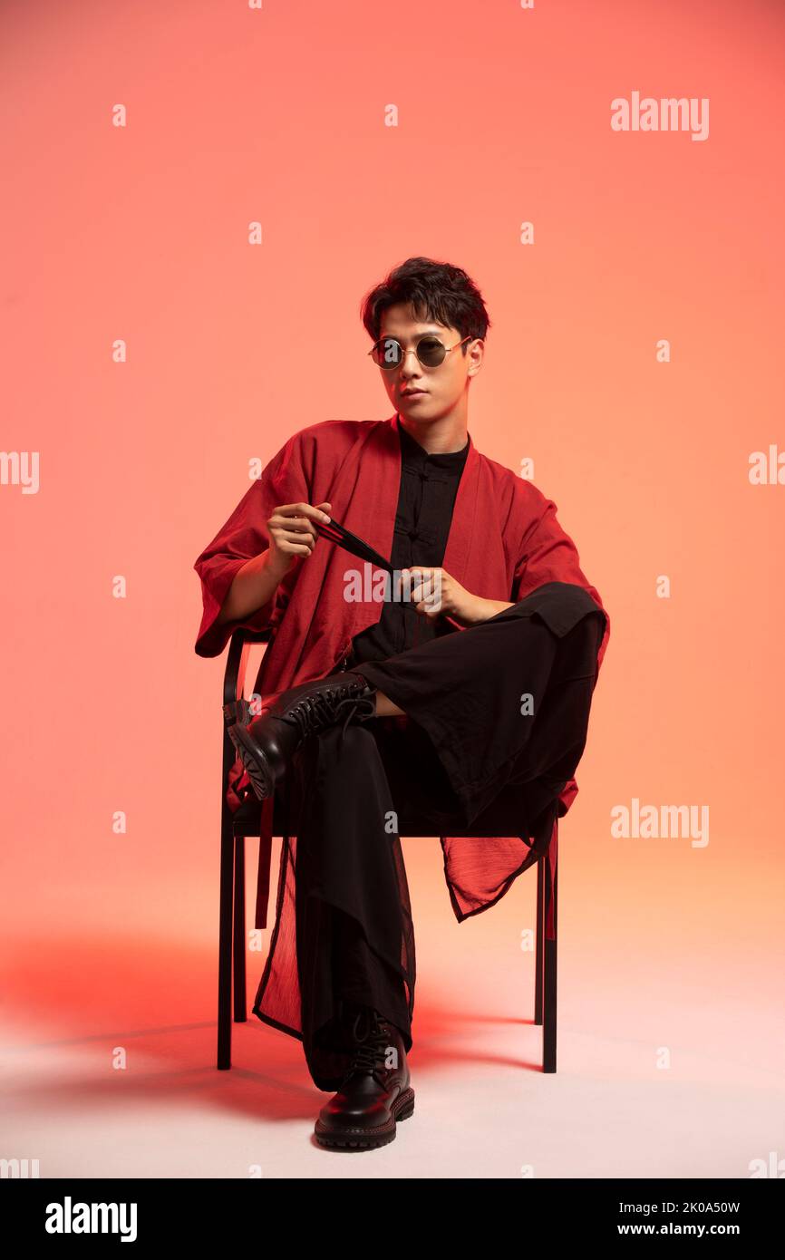 Portrait of confident young Chinese man Stock Photo - Alamy