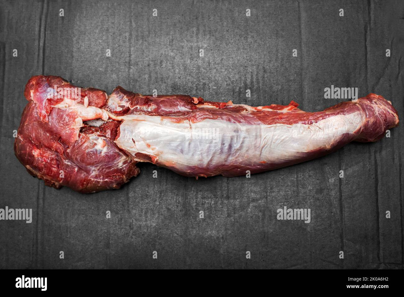 Top View of Fresh Raw Beef Thigh on Gray Cardboard Surface Stock Photo ...