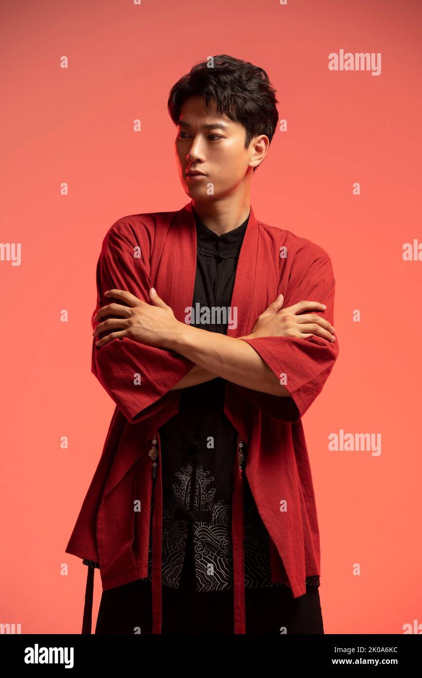 Portrait of confident young Chinese man Stock Photo - Alamy