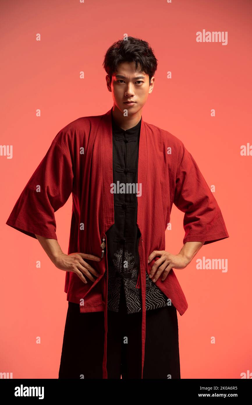 Portrait of confident young Chinese man Stock Photo - Alamy