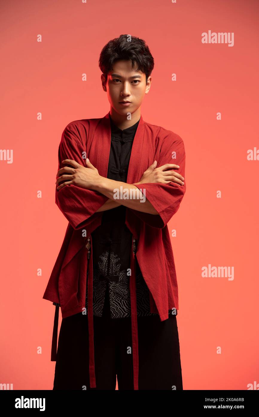 Portrait of confident young Chinese man Stock Photo - Alamy