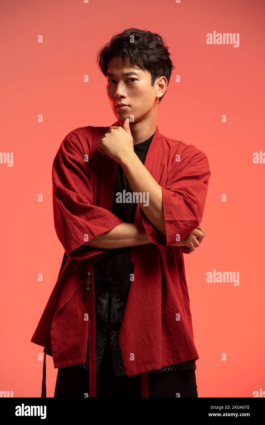 Portrait of confident young Chinese man Stock Photo - Alamy