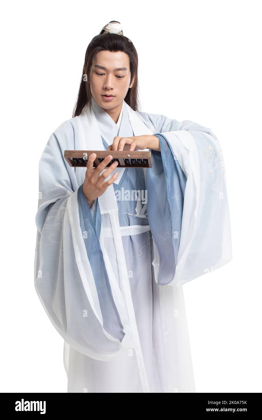Young Chinese man in ancient costume holding an abacus Stock Photo - Alamy