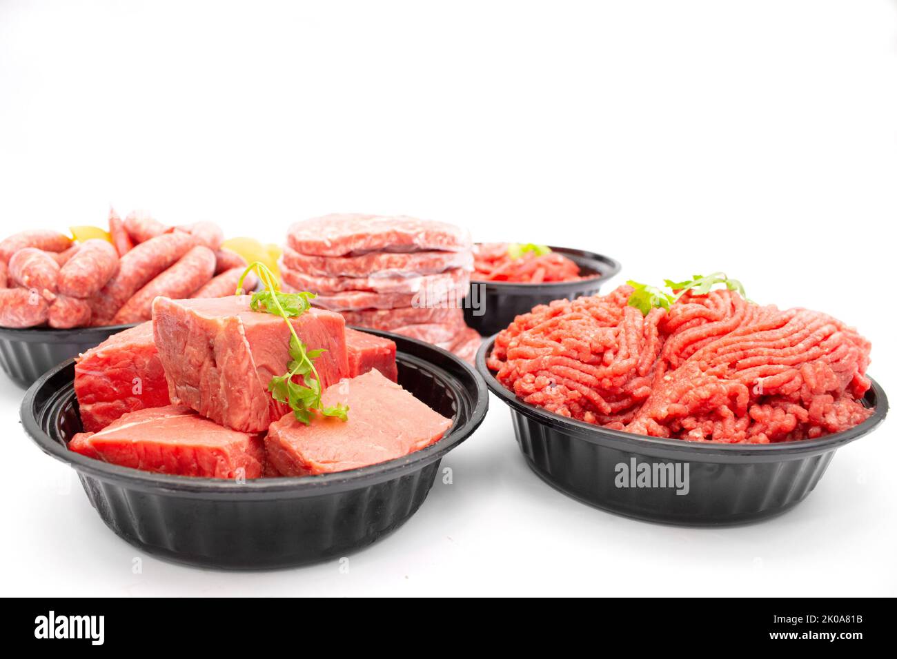 Side View of Assorted Raw Beef Cuts, Minced Meat, Sausages, and Burger ...