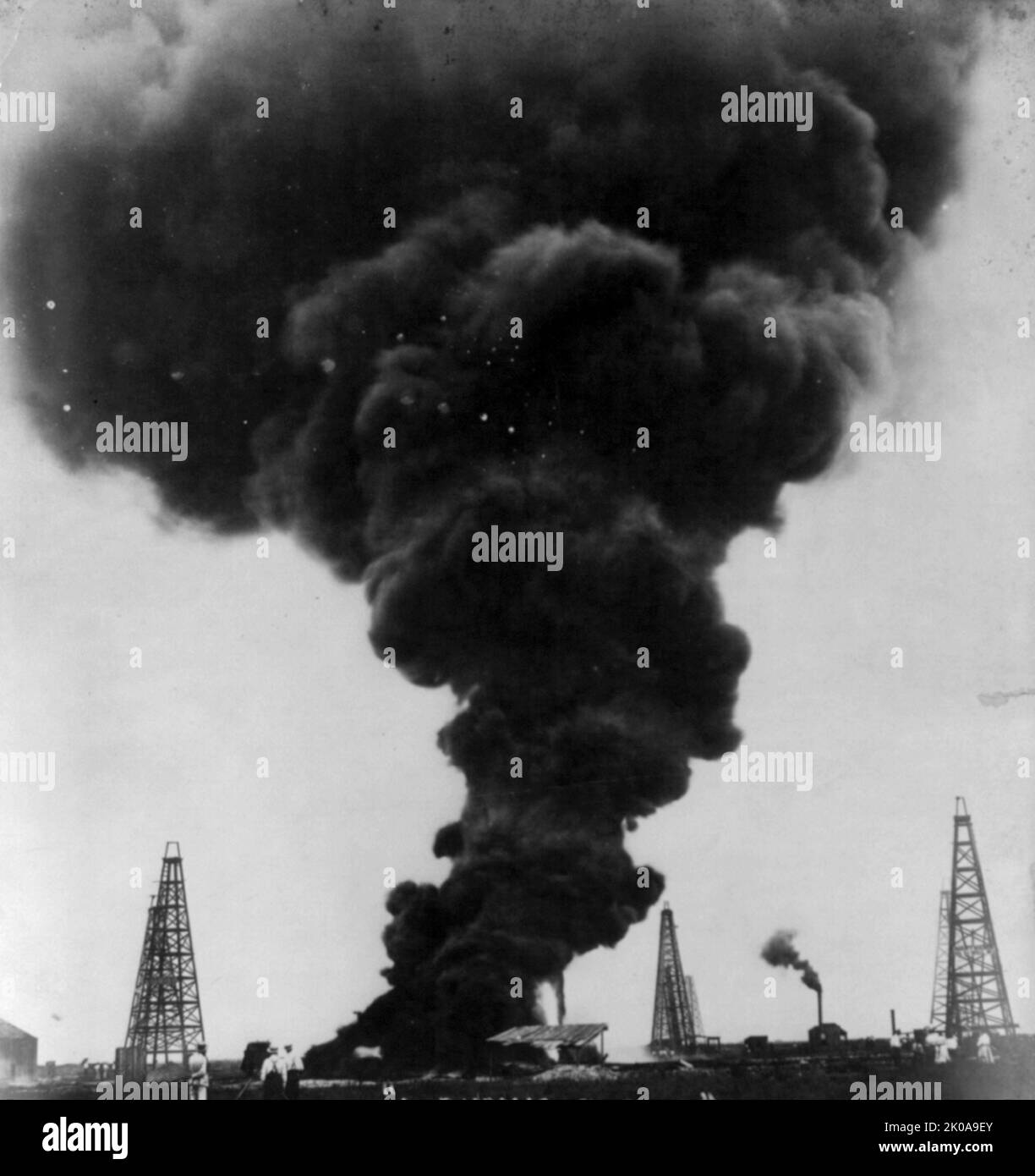 A burning gusher, photographic print of smoke above a burning oil well ...