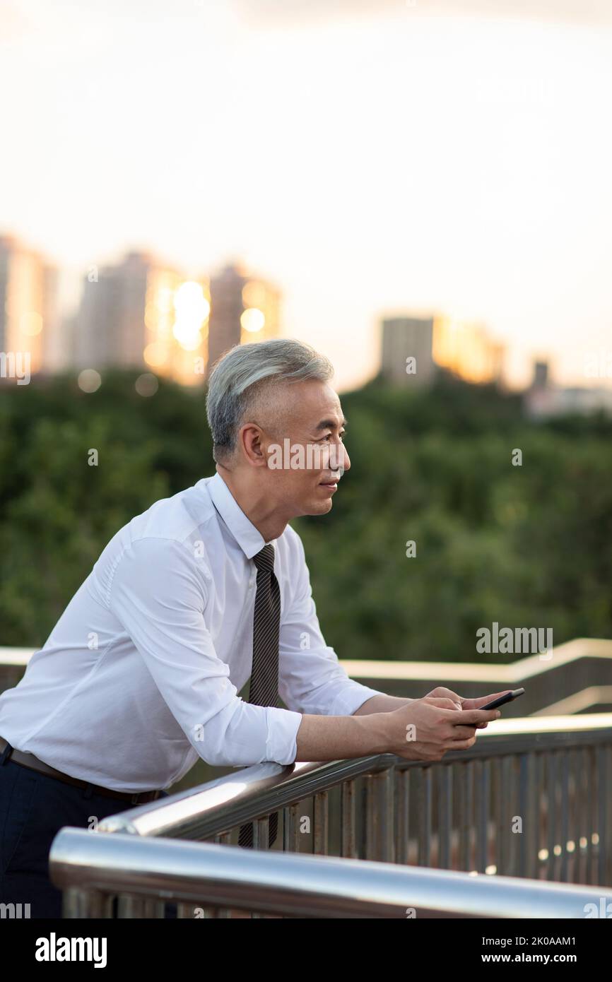 Side view confident chinese man hi-res stock photography and images - Alamy