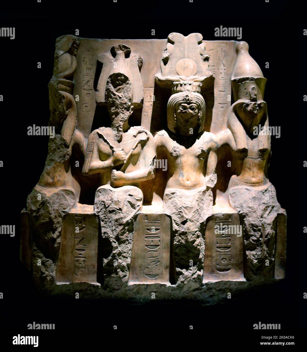 This group statue depicts Horemheb with the Abydene triad. From left to ...