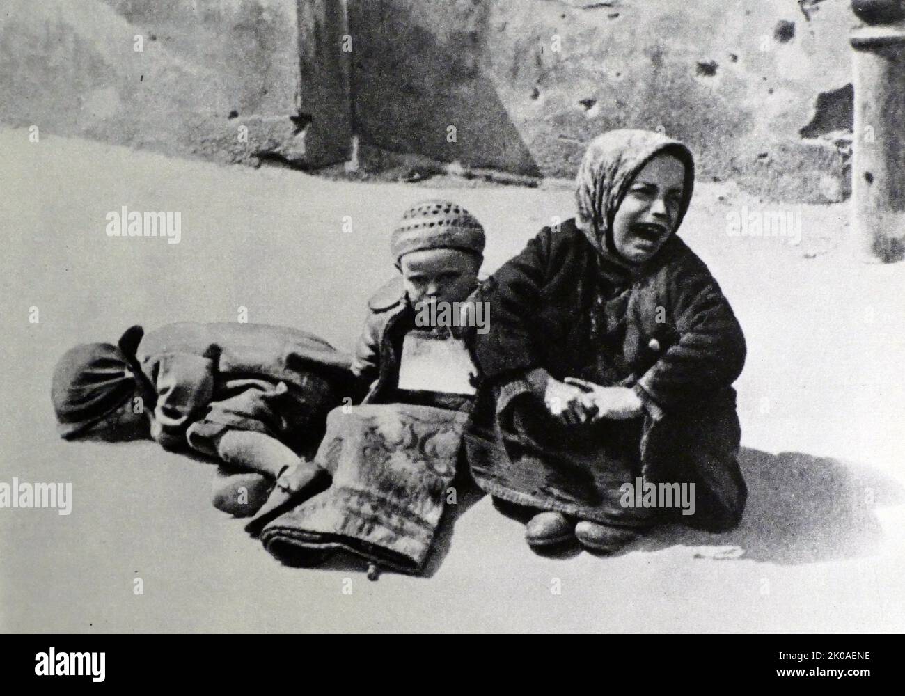 Homeless Jewish children on the street in the Warsaw Ghetto, Poland ...