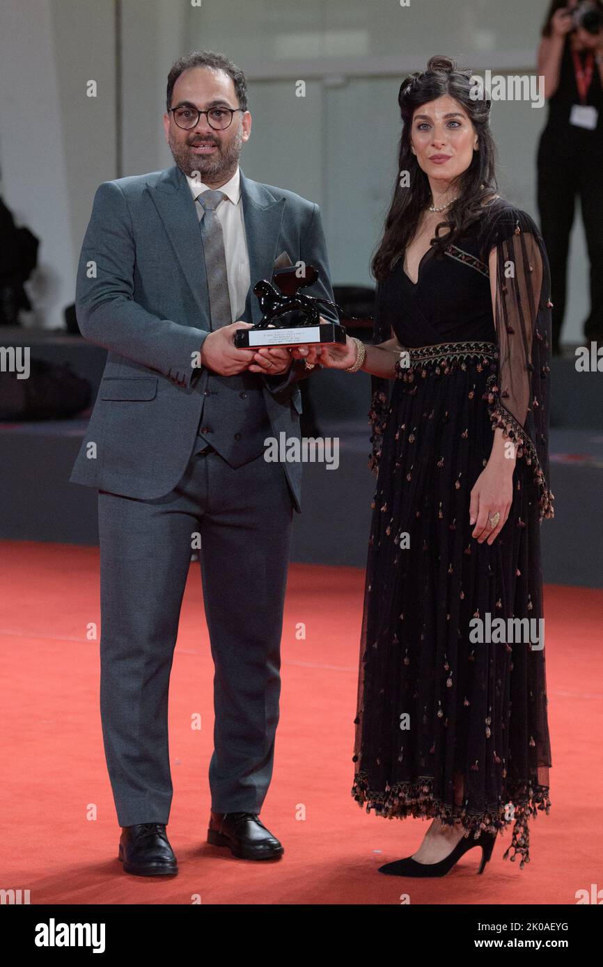 Venice, Italy. 10th Sep, 2022. Reza Heydari and Mina Kavani pose with the Special Jury Prize for ...