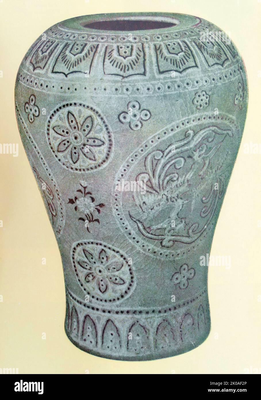 Vase, Celadon glaze; inlaid twin phoenix design in underglaze iron ...