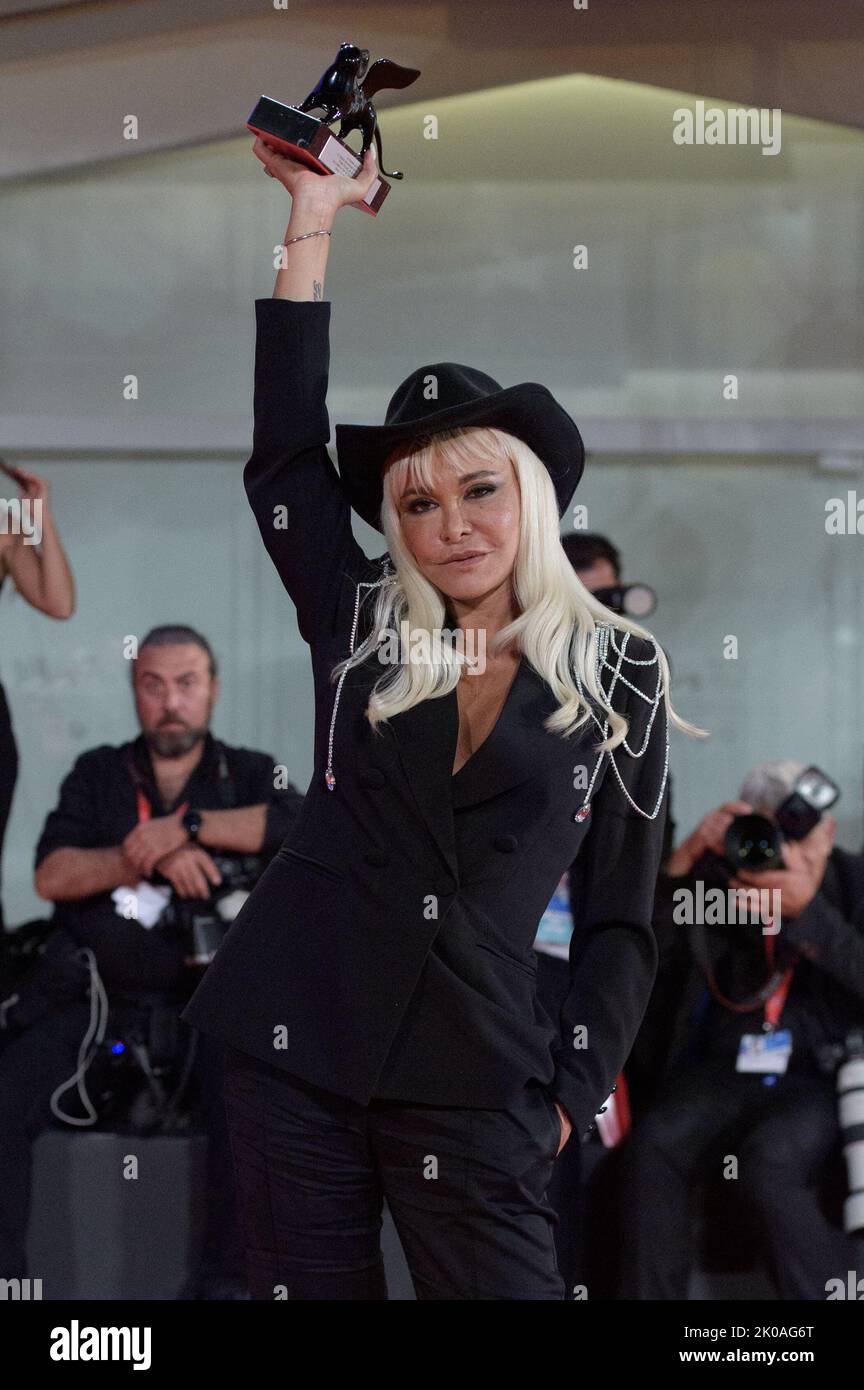 Vera Gemma poses with the Orizzonti Award for Best Actress for “Vera ...