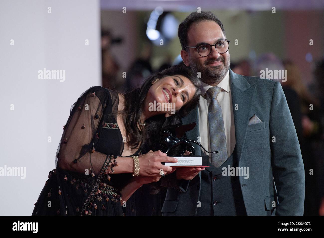 Reza Heydari and Mina Kavani pose with the Special Jury Prize for "Khers Nist" (No Bears ...
