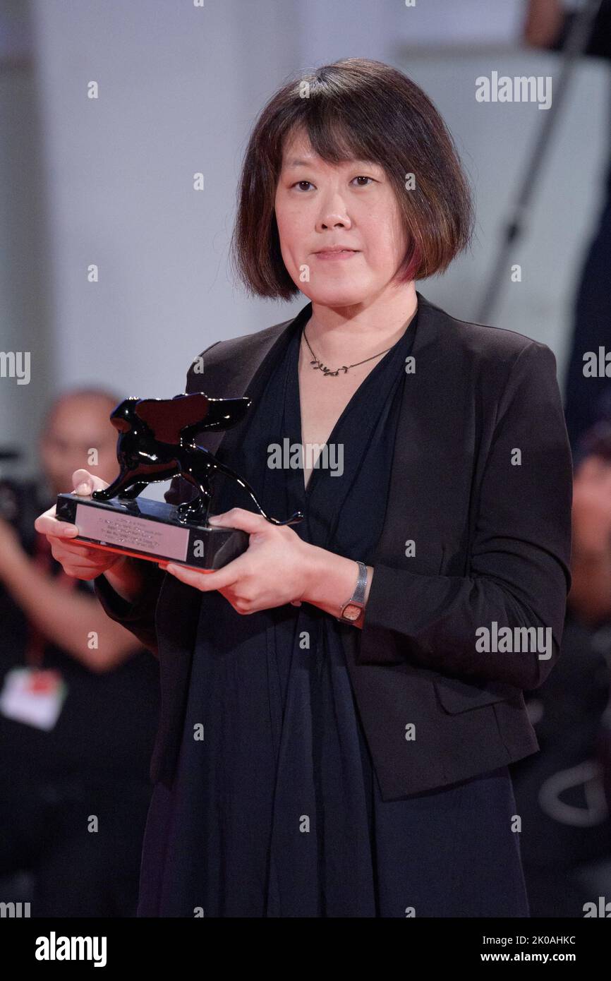 Venice, Italy. 10th Sep, 2022. Singing Chen poses with the Venice ...