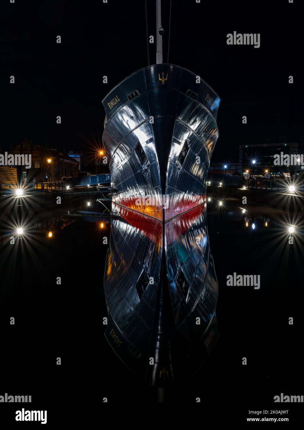 Bow of luxury floating hotel ship Fingal Edinburgh lit up at night in ...